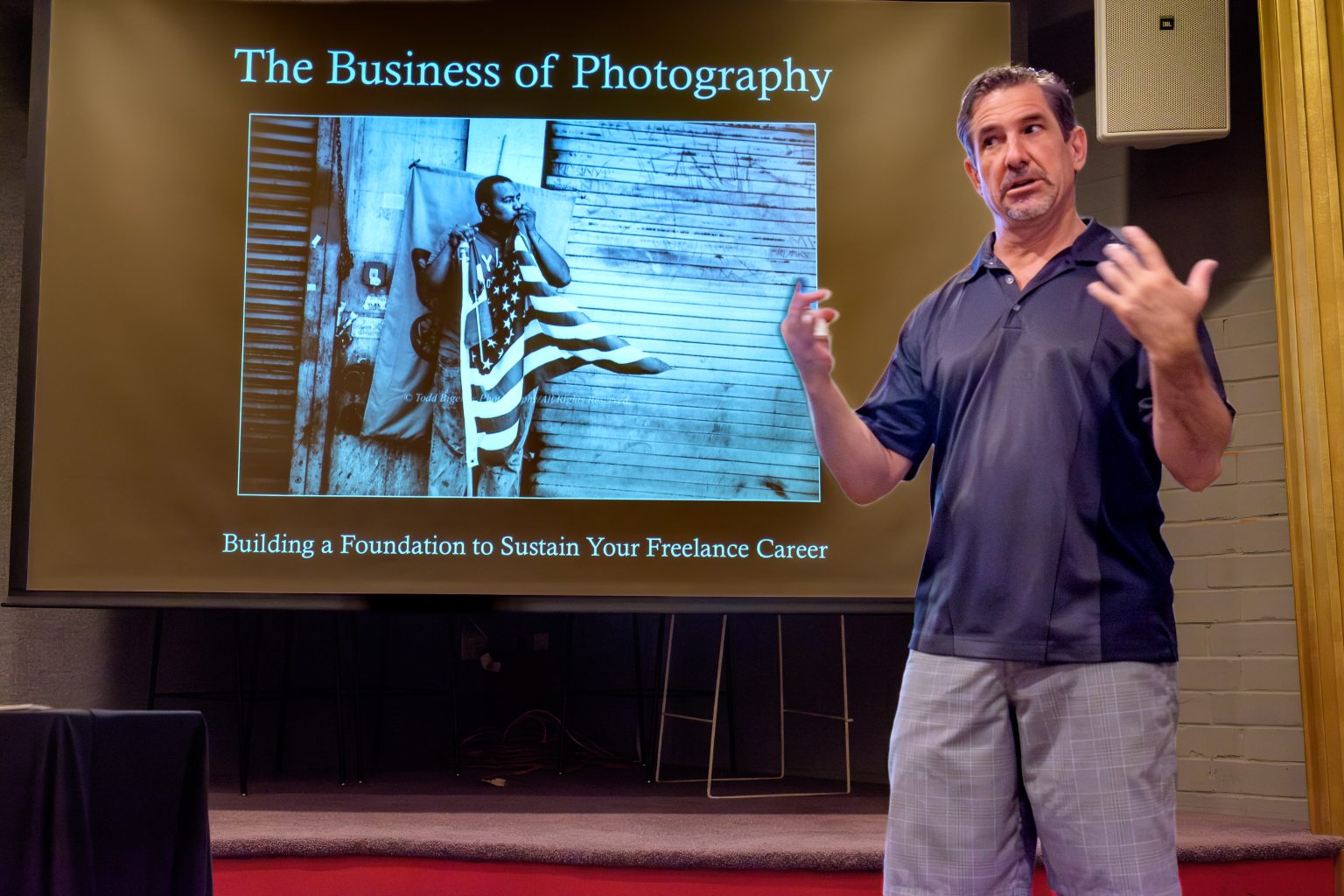 Event Photography: How to Photograph a Speaker on Stage - Storyteller